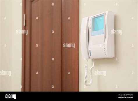Modern Intercom System With Handset On White Wall Indoors Space For
