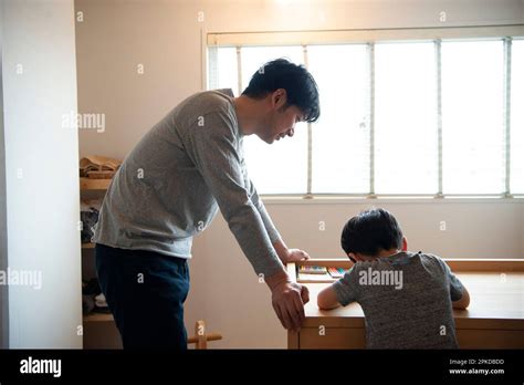 Father With Babe Studying Stock Photo Alamy