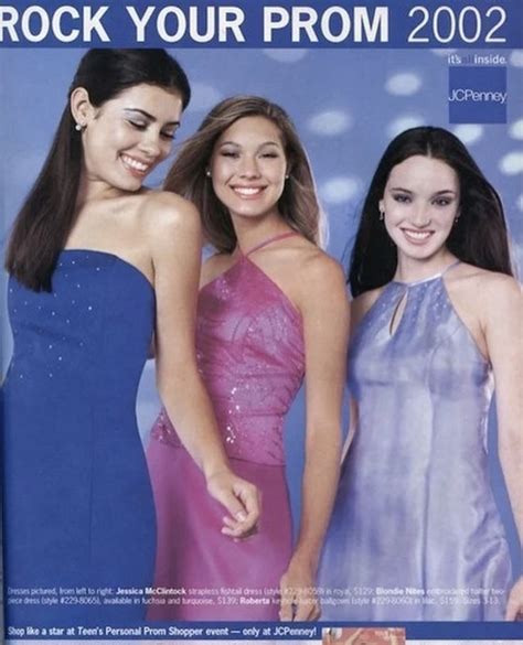 Two Women In Dresses Standing Next To Each Other With The Words Rock