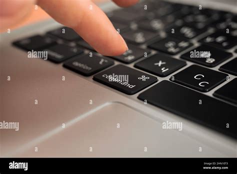 Hand Pressing Command Key On Modern Laptop Keyboard Command Sign And Symbol Closeup Stock Photo