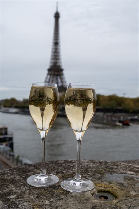 Drinking Of French Sparkling Wine Champagne From Tulip Glasses With