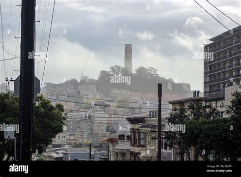 Iconic Landmark Coit Tower On Misty Telegraph Hill Viewed From Russian