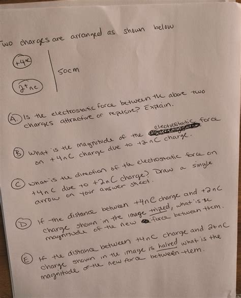 Solved Wo Charges Are Arranged As Shown Below A Is The Chegg Com