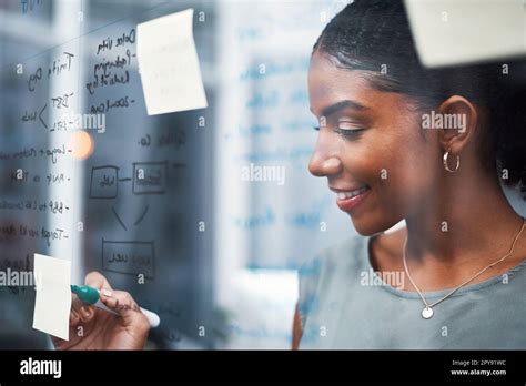 She Turns Visions Into Reality A Young Businesswoman Brainstorming