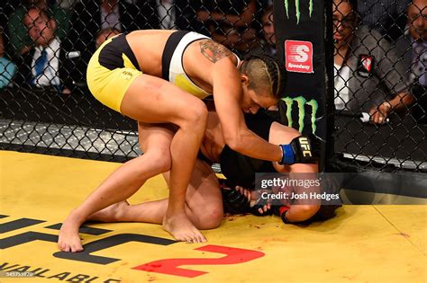 Amanda Nunes Of Brazil Grapples With Miesha Tate In Their Ufc Womens
