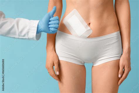 Surgeon Showing Thumb Up To Applied Medical Patch On Female Body After Appendectomy Surgery