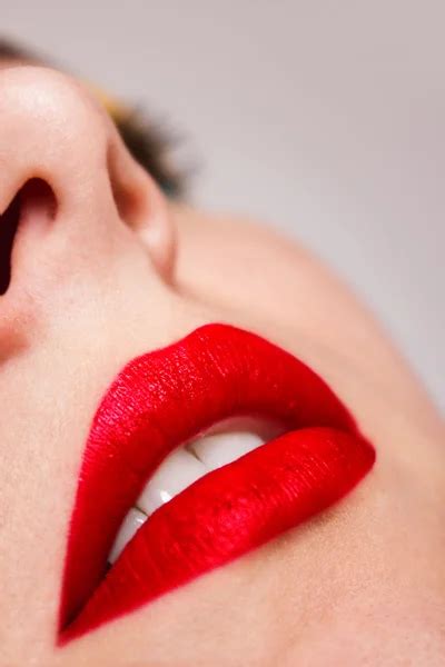 Woman With Red Lips Kissing Stock Photo Aoosthuizen