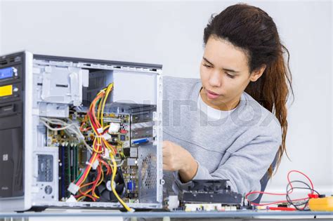 Woman Repairing Computer Stock Image Colourbox