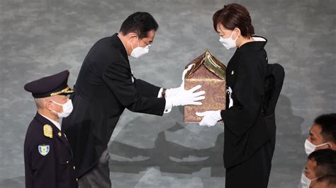 Whro Japan Holds A Controversial State Funeral For Former Prime