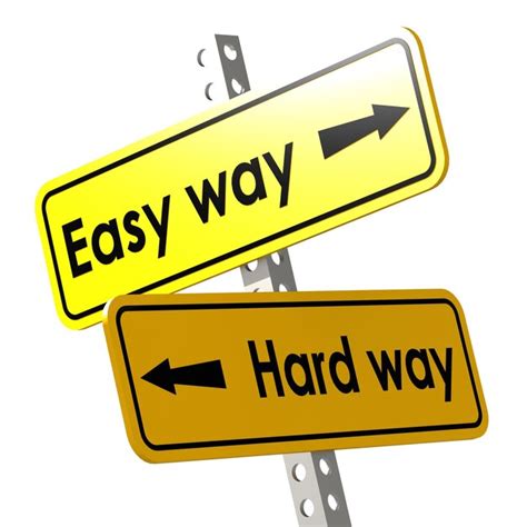 premium photo easy way and hard way with yellow road sign
