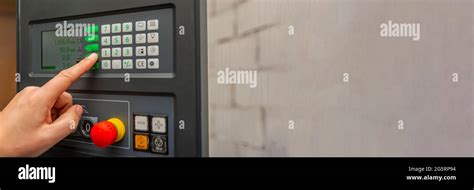 The Process Of Programming A Cnc Machine Entering Data Into A Computer