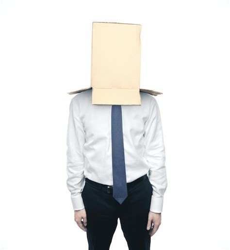 Businessman With A Box On Head Premium Photo