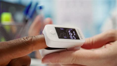 Medical Specialist Takes Oxygen Saturation Measurement And Checking Vital Signs Stock Video