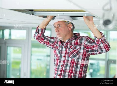 Man Installing Plasterboard Hi Res Stock Photography And Images Alamy