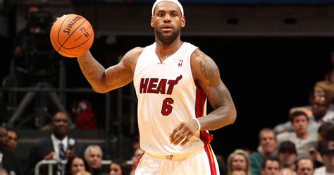Lebron Plants One On Fan Leads Heat To Victory Cbs Miami