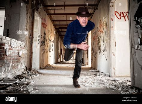 Man Running Scared Hi Res Stock Photography And Images Alamy