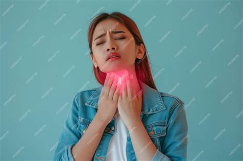 Premium Photo A Young Girl Has A Sore Throat Thyroid Problems