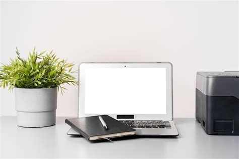 Premium Photo Printer And Laptop On Grey Table In Office