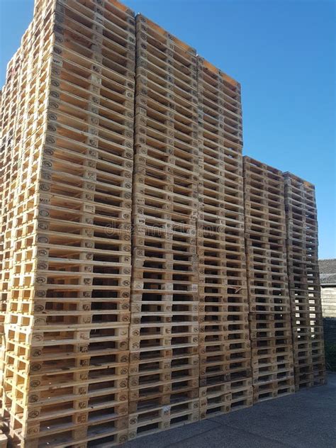 Euro Type Pallets Stacked Up Stock Photo Image Of Building Stacked 217534336