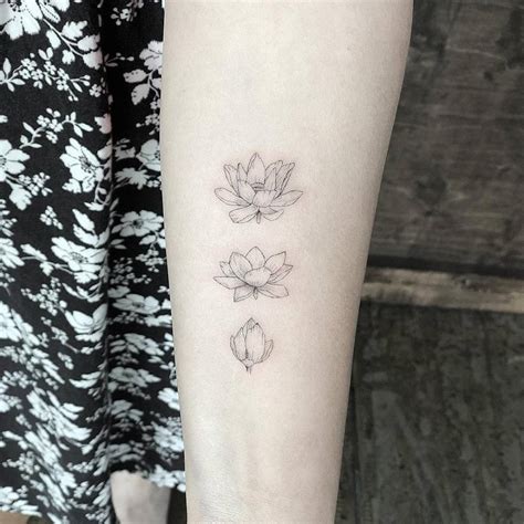 Forearm Lotus Flower Tattoo