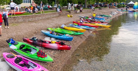 Support Boat And Paddler Sign Up Across The Lake Swim