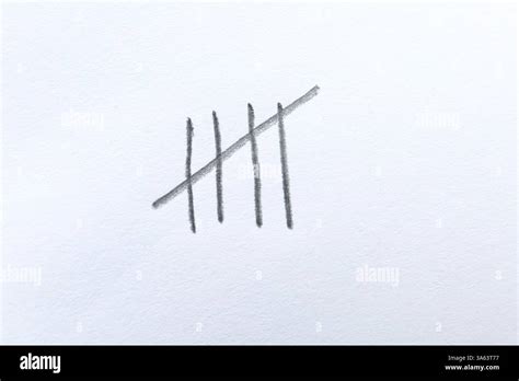 Counting Days By Drawing Sticks With Pencil On White Background