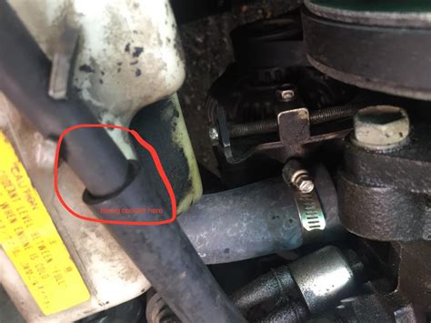 replace coolant overflow hose
