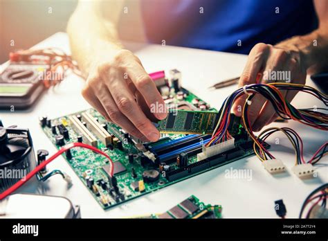 Computer Assembly Technician Install Ram Memory Module On Motherboard