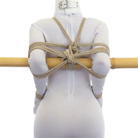 what is this type of bondage with elbows tied around a bar at the back