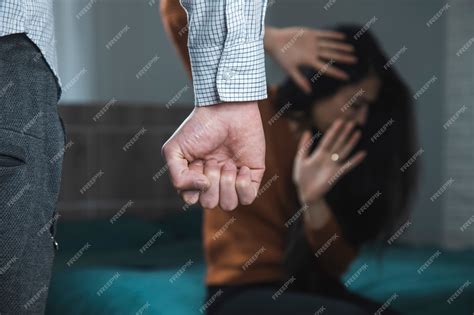 Man Beating His Wife