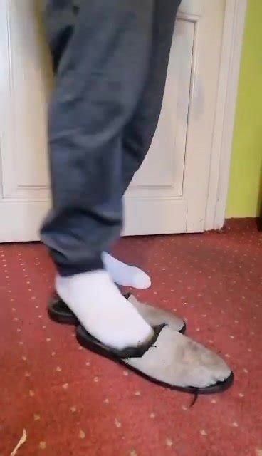 Old Trashed Cord Slippers And White Socks