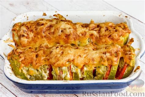 Рецепт Кабачки запечённые с помидорами под сметанным соусом и сыром на