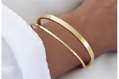 شیک ترین مدل های دستبند النگویی طلا طرح آینه ای