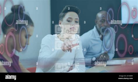 image of qr code and data processing over diverse business people in