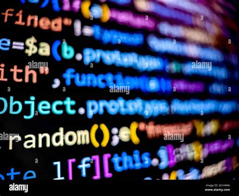 Pixelated Lines Of Computer Code Displayed On A Digital Screen With Blurred Focus Background