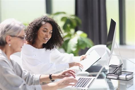 Premium Photo Software Development Team Discussing Algorithms On