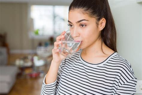 Lady Drinking Water At Joan Currie Blog