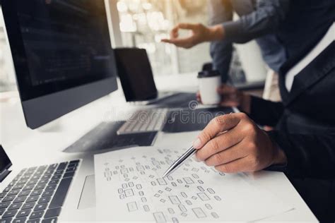 Two Partnerships Developing Programming And Coding Technologies Working On Laptop And Analyzing