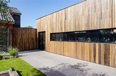 Wood Cladding Architecture 8 Examples Of Vertical Timber Cladding With
