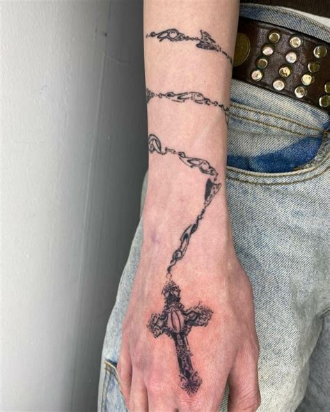11 Cross Tattoo On Wrist Designs That Will Blow Your Mind