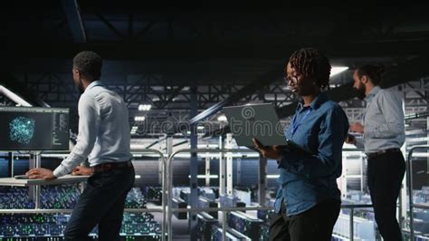 Data Center Software Developers Using Devices To Review Ai Llm