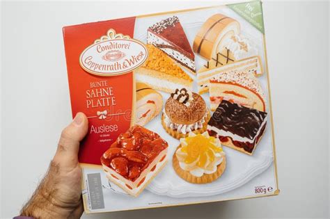 Assorted Cakes In Box Held By Hand Editorial Stock Image Image Of