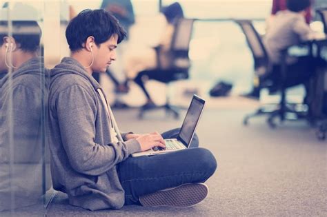 Premium Photo Young Indian Software Developer Man Using Laptop Computer Writing Programming