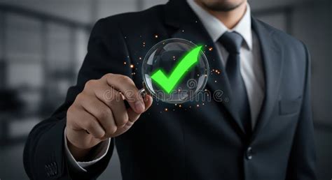 A Businessman Carefully Examines A Digital Check Mark Through A Magnifying Glass Symbolizing