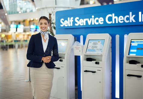 Woman Passenger Assistant And Airport By Self Service Check In Station For Information Help Or