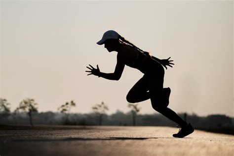 Premium Photo Side View Of Man Jumping Against Sky