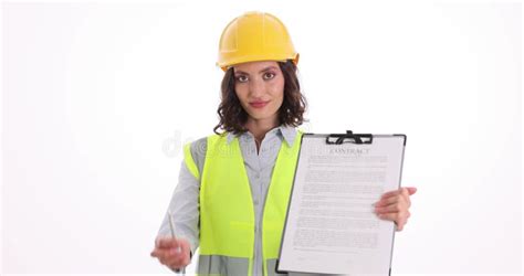 Woman Engineer In Helmet Holds Contract On Clipboard Stock Footage