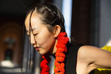 Portrait Of An Asian Girl Dancing In The Street With Her Friend Stock
