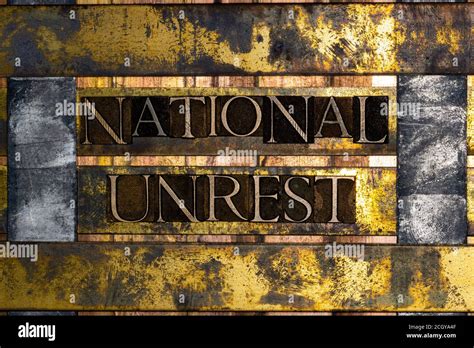 national unrest text formed by real authentic typeset letters with