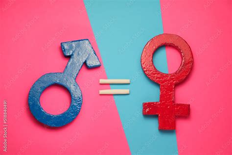 Gender Equality Equal Sign Male And Female Symbols On Color Background Flat Lay Stock Photo